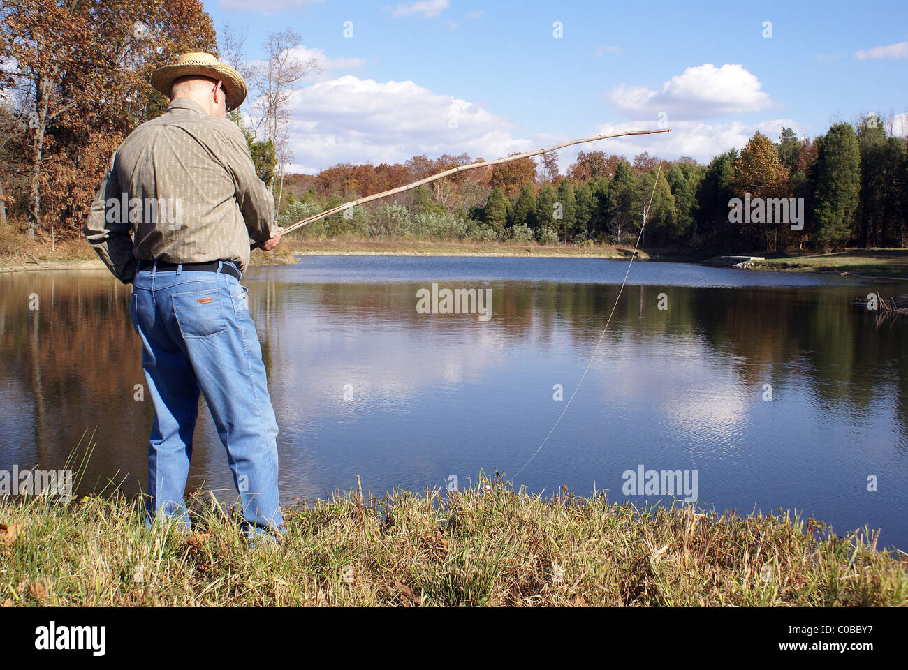 Cane pole fishing hi-res stock photography and images - Alamy