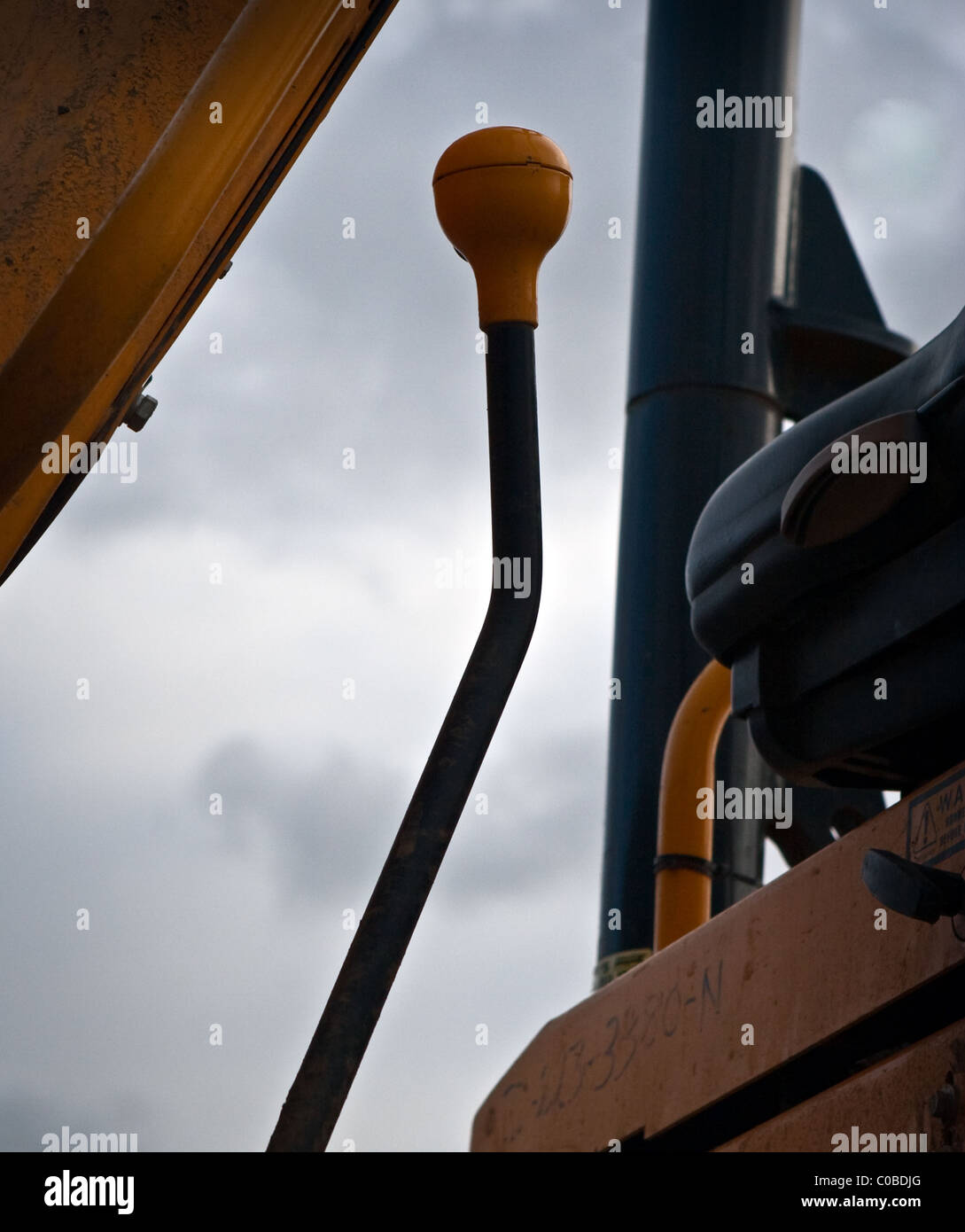 Parts of a mechanical digger on a Sunday on the biggest house building ...