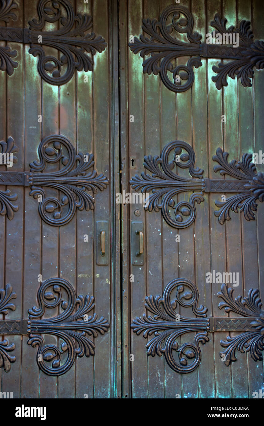 Metal door on church entrance Stock Photo - Alamy