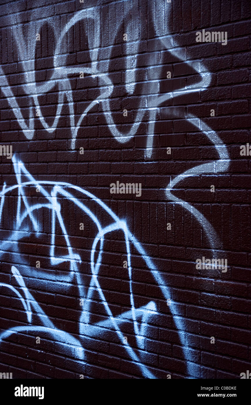 White graffiti on painted wall Stock Photo - Alamy