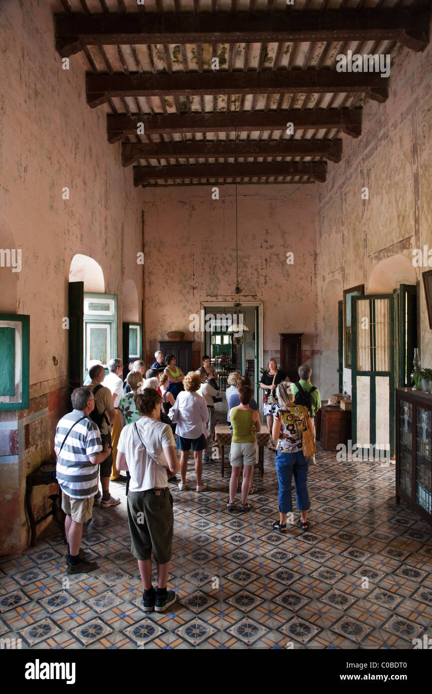 Tourists at the run-down 17th century henequen hacienda Yaxcopoli near ...