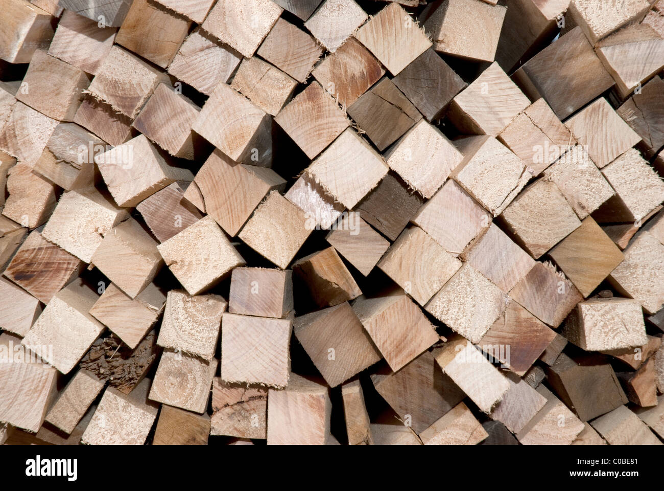 Firewood from the sawed pine background Stock Photo - Alamy
