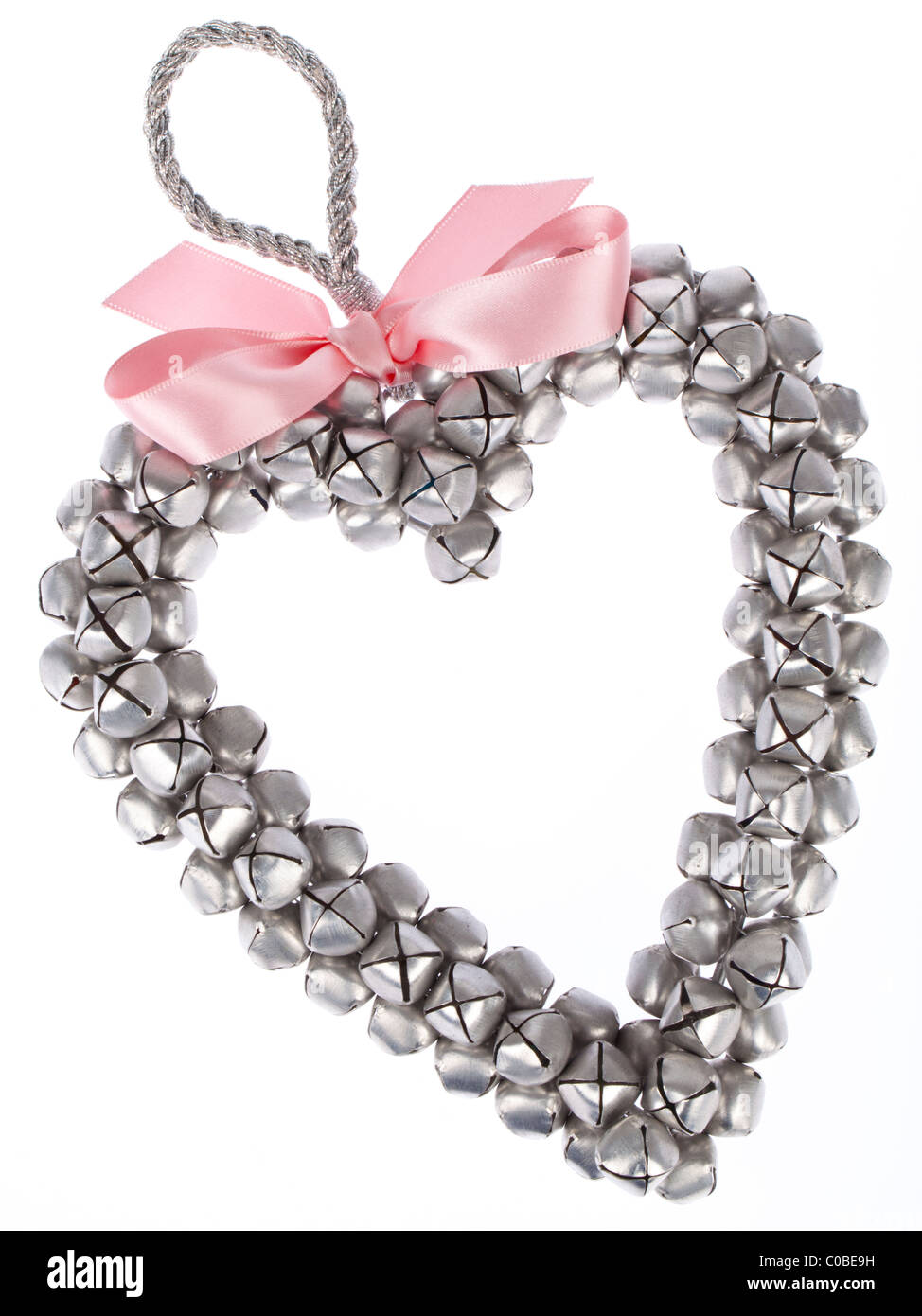 Heart shaped ring of bells with pink bow on white background Stock ...