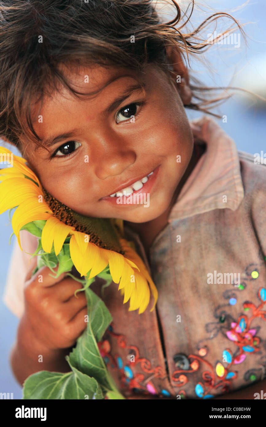 Cute girl with sunflower Andhra Pradesh South India Stock Photo - Alamy