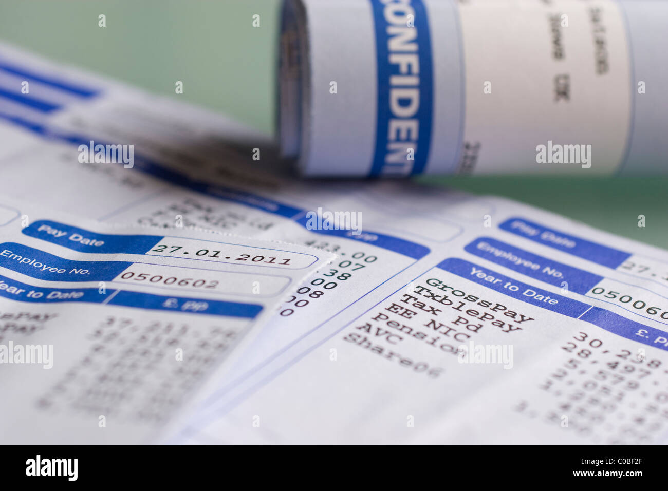 Wage slips, wages pay payslips wageslips Stock Photo - Alamy