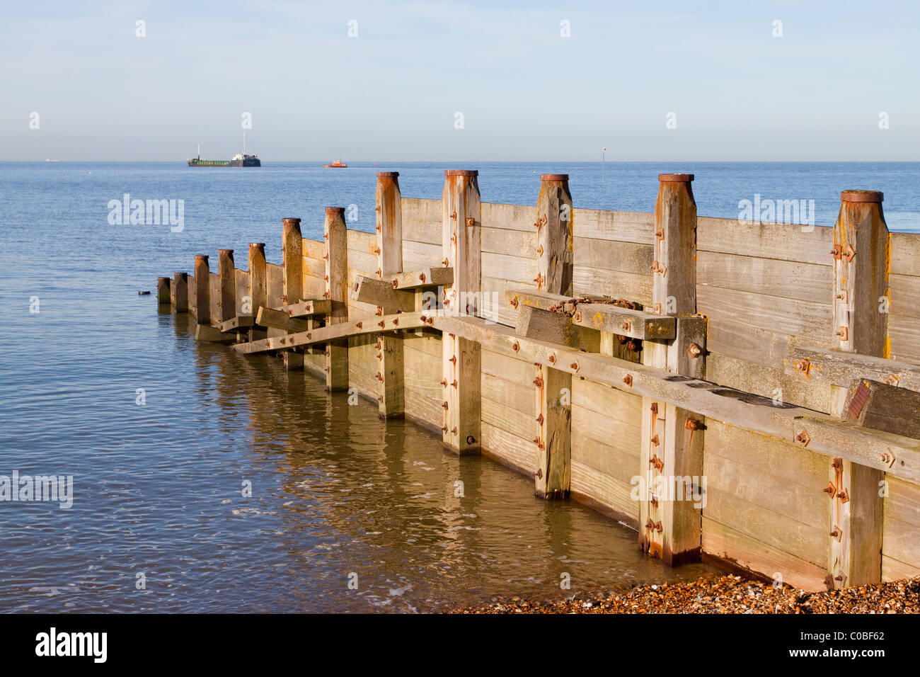 Detail of wooden groyne on Whitstable beach near the harbour ...