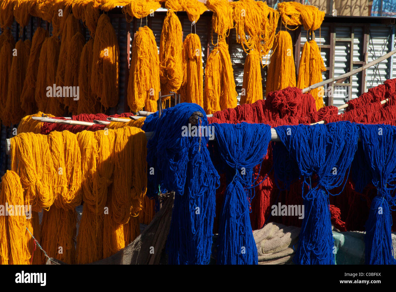 Hanks of wool hanging to dry in the Dyers' Souk, Marrakech, Morocco ...