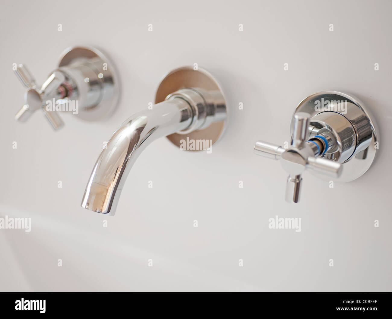Washbasin tap in a bathroom Stock Photo - Alamy
