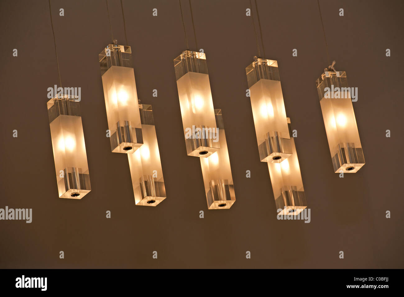 Designer interior ceiling lighting hanging Stock Photo - Alamy
