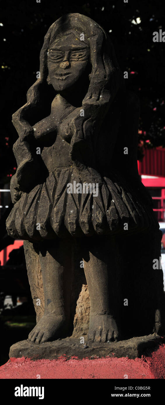 Close-up of brown effigy of La Pincoya mythical sea-goddess, standing ...