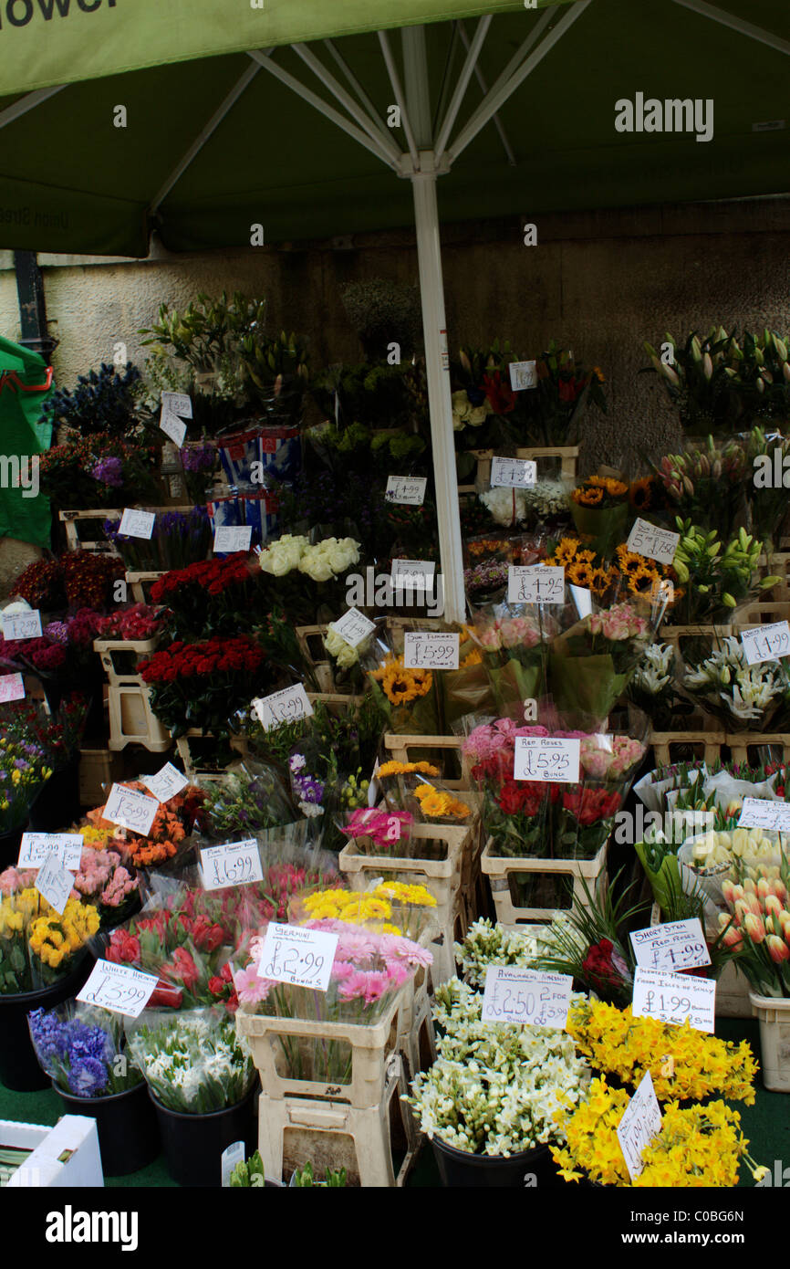 Cut-flower stall at a market Stock Photo - Alamy