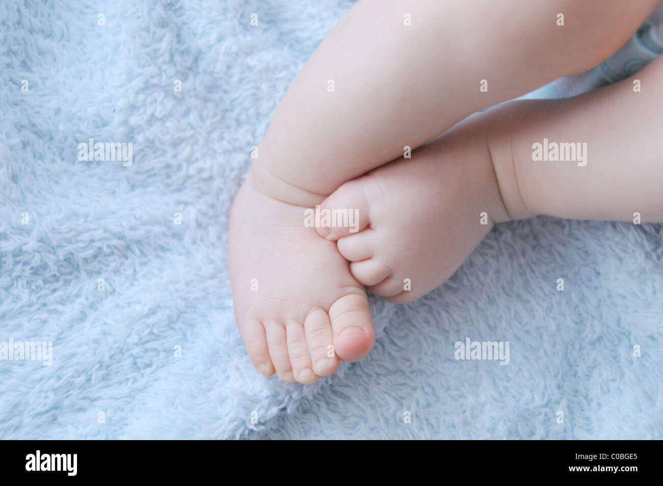 Curled up toes hi-res stock photography and images - Alamy
