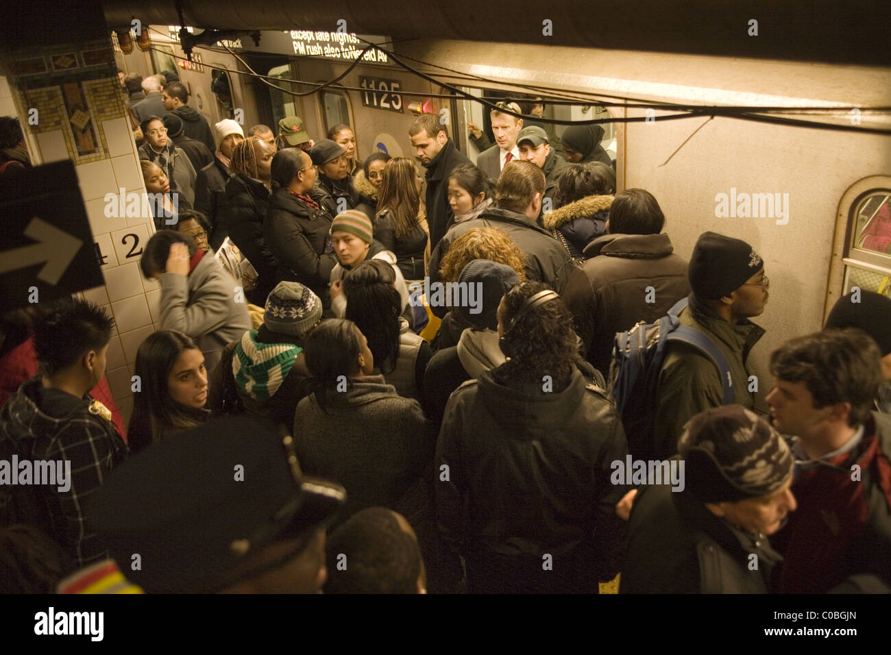 NYC subway system is jammed during the evening rush hour. Grand Central ...