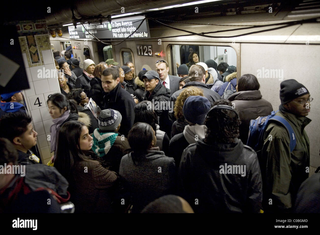 NYC subway system is jammed during the evening rush hour. Grand Central ...