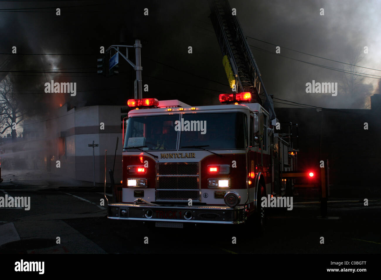 Montclair FD at scene of a store fire in NJ Stock Photo - Alamy