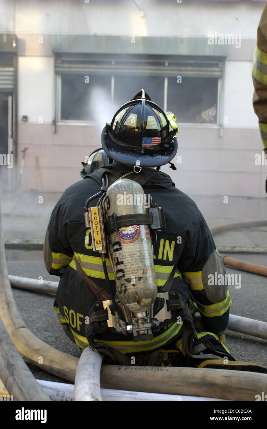 Firefighter scba ladder hi-res stock photography and images - Alamy
