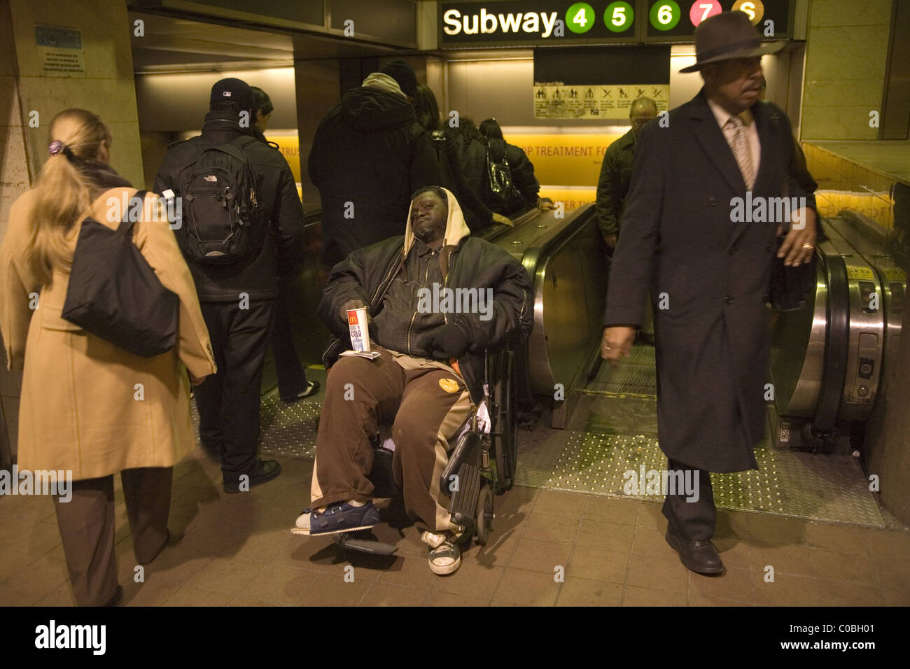 Severely disabled man in wheel chair begs for money at Grand Central ...
