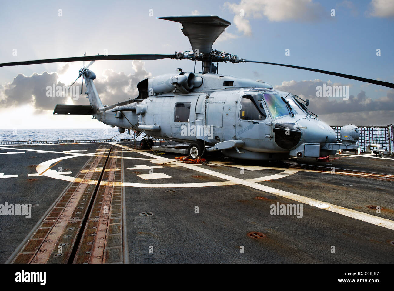 Navy Rescue Helicopter. Helo on USS Destroyer at sea on deployment ...