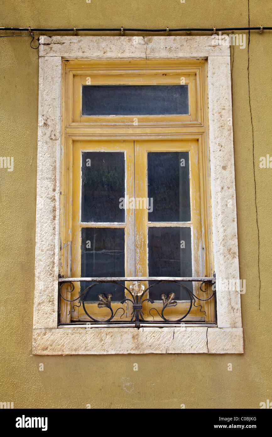 Yellow Wood Weathered Window of Old World Europe Stock Photo - Alamy