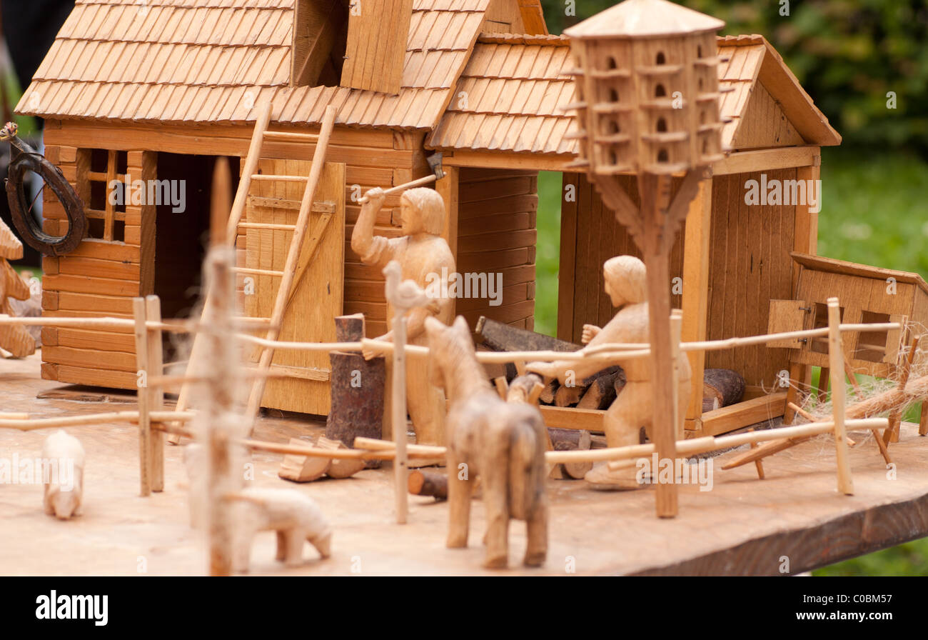 Wooden village with small figures Stock Photo - Alamy
