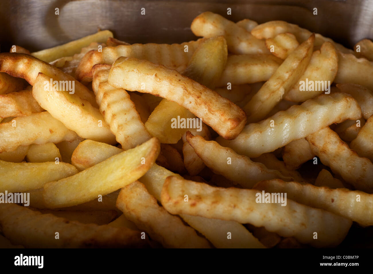 Oven-ready frozen chips Stock Photo - Alamy