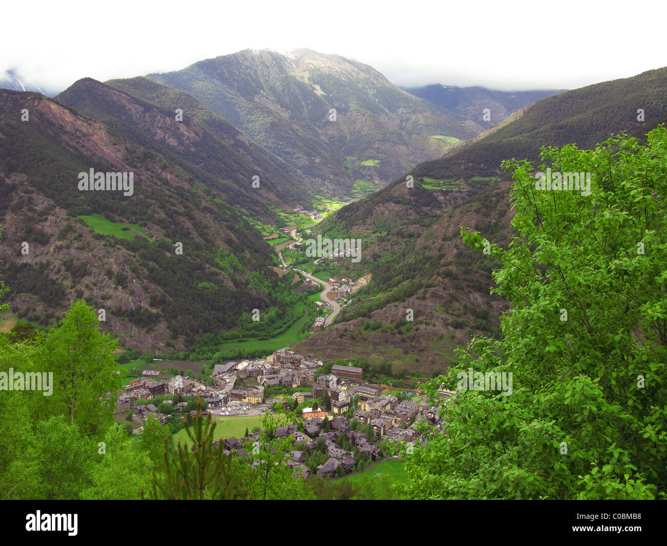 A village into a Pyrenees valley, between mountains Stock Photo - Alamy