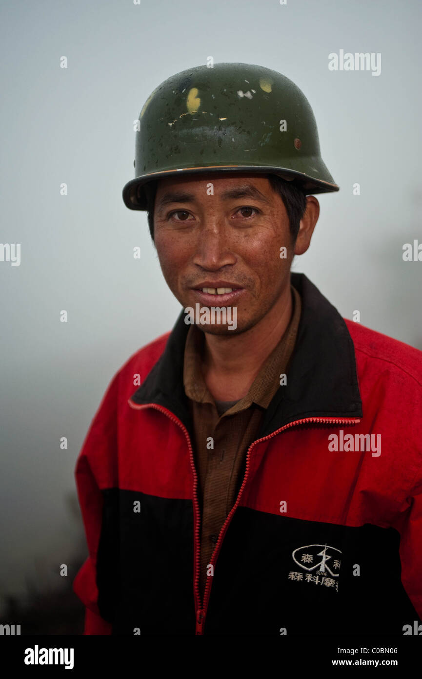 Miao people working on a Taxus / Yew tree plantation project Stock ...