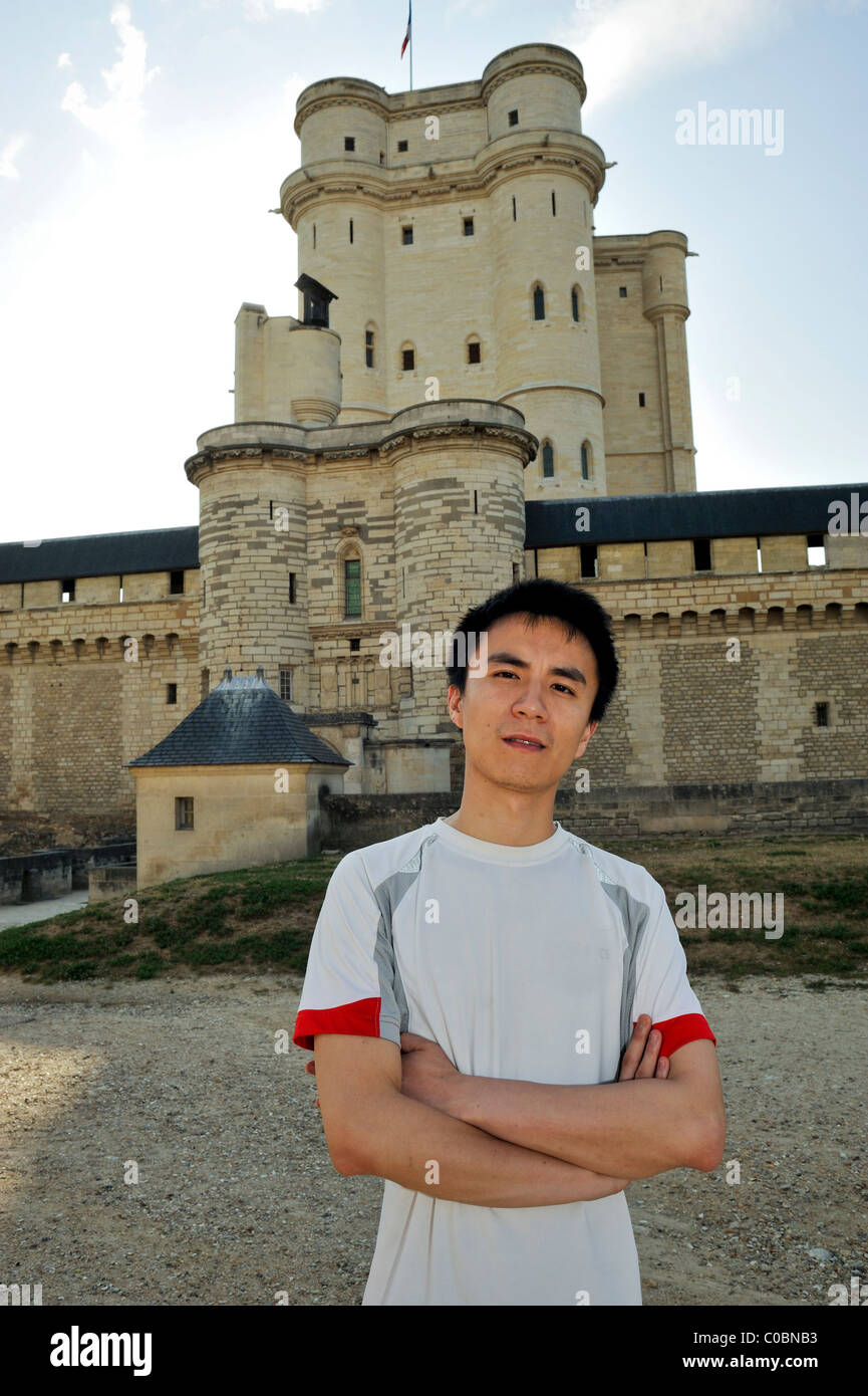 Paris, France, Portrait Young Chinese Man with arms crossed, Tourist ...