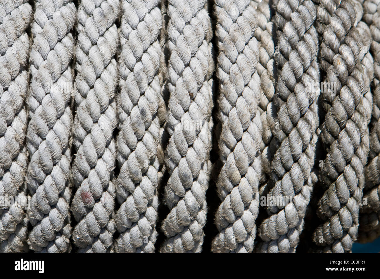 Full frame of coiled grey rope Stock Photo - Alamy