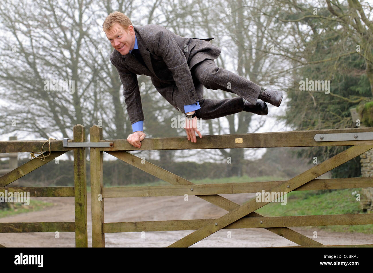 Adam Henson Cotswold farmer and tv presenter jumps his farm gate ...