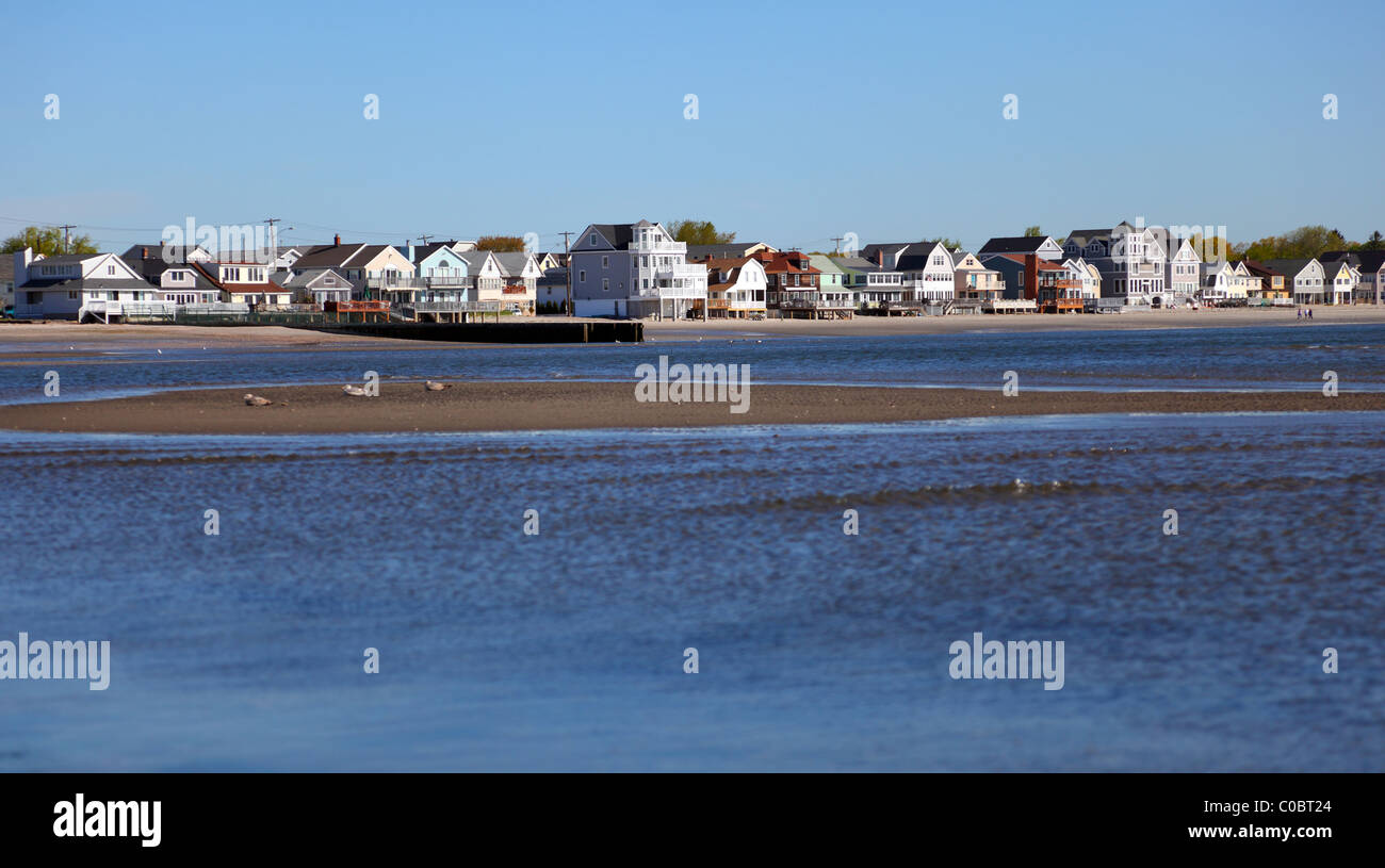 Waterside side colonial style houses on the beach Stock Photo - Alamy