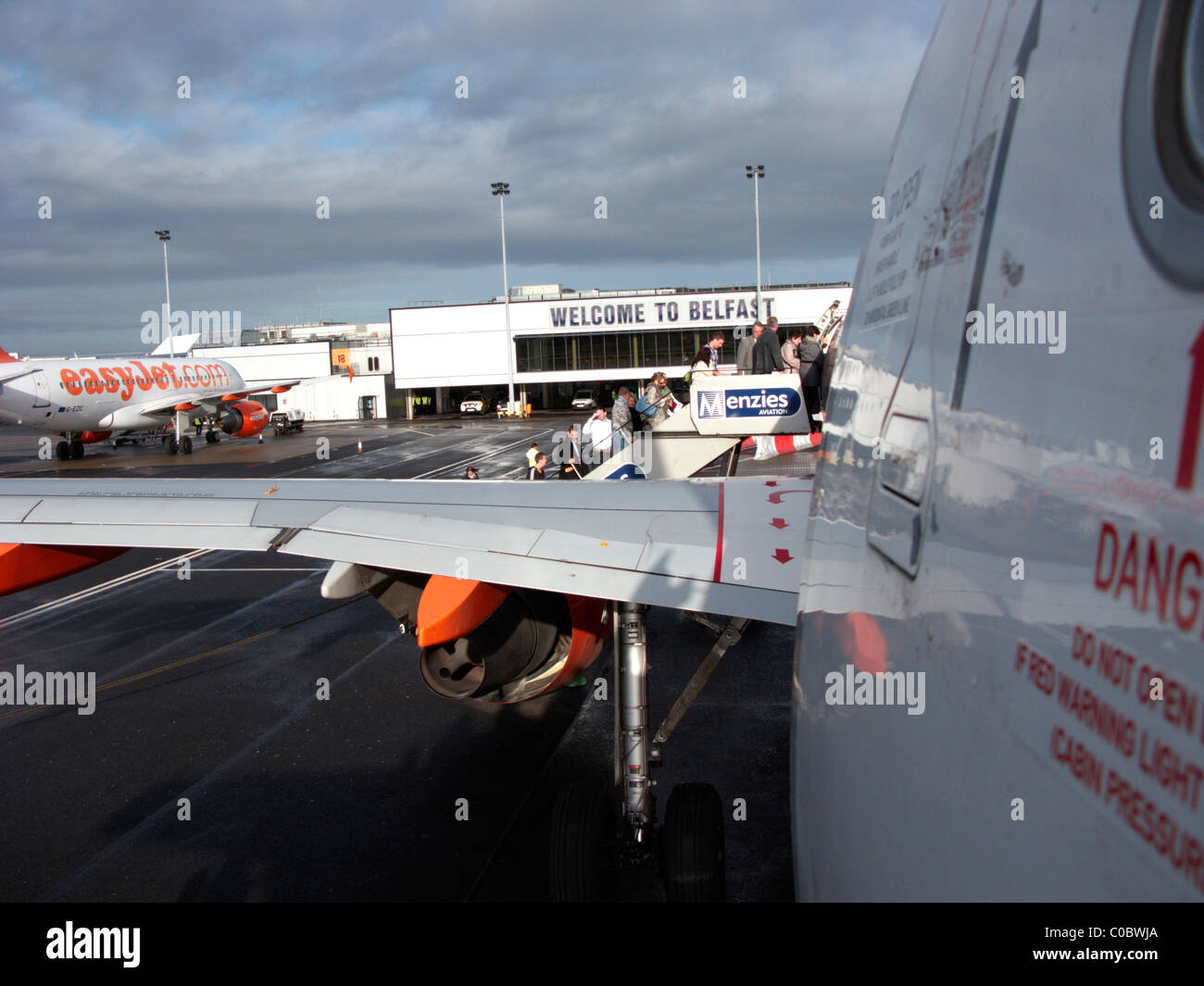 passengers boarding easyjet a319 airbus aircraft at Belfast ...