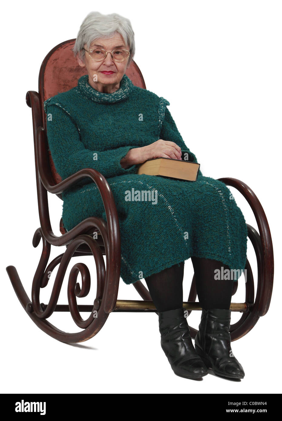 Old woman sitting in rocking Cut Out Stock Images & Pictures - Alamy