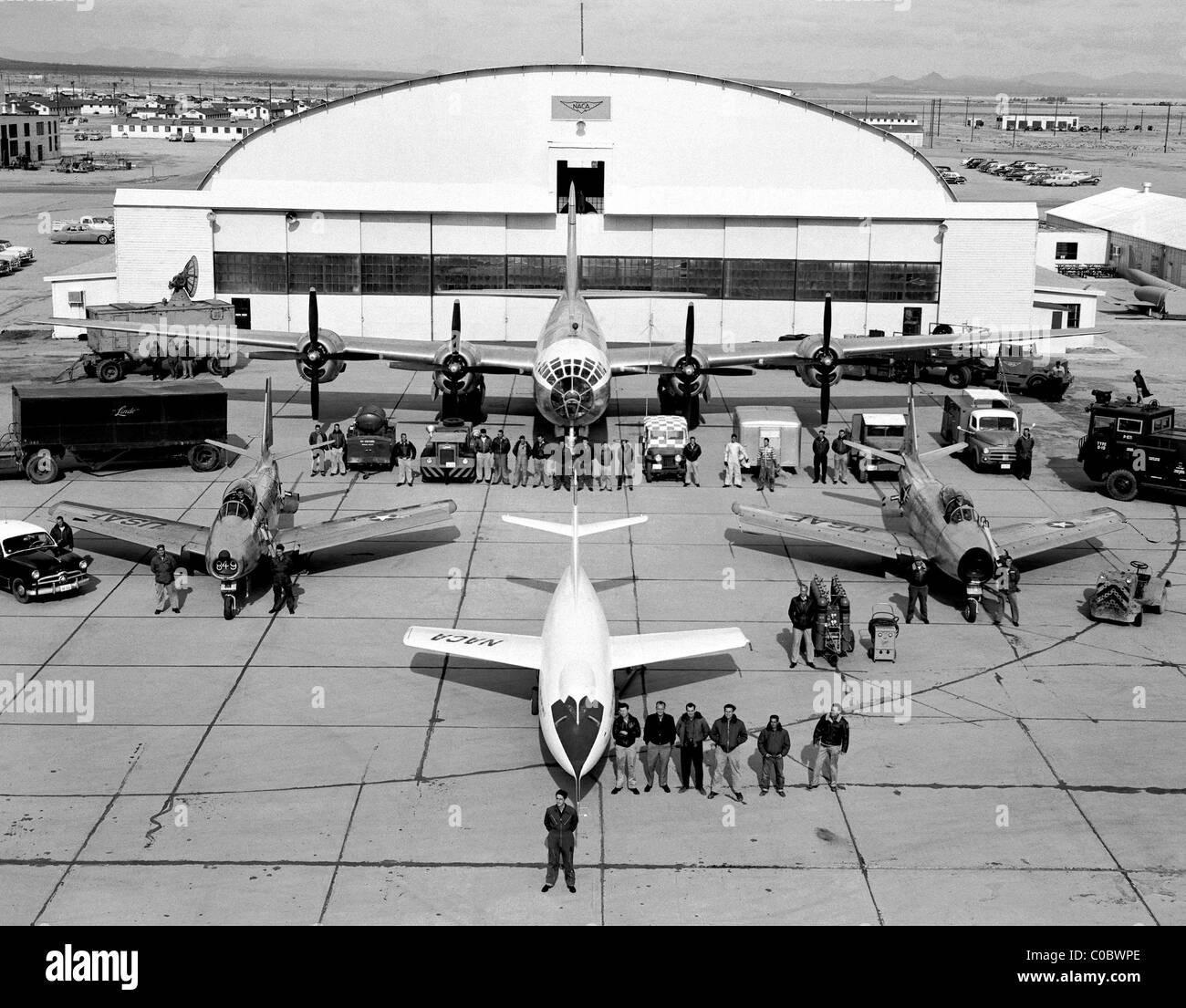 NACA test aircraft are assembled in front of the hangar 1952 Stock ...