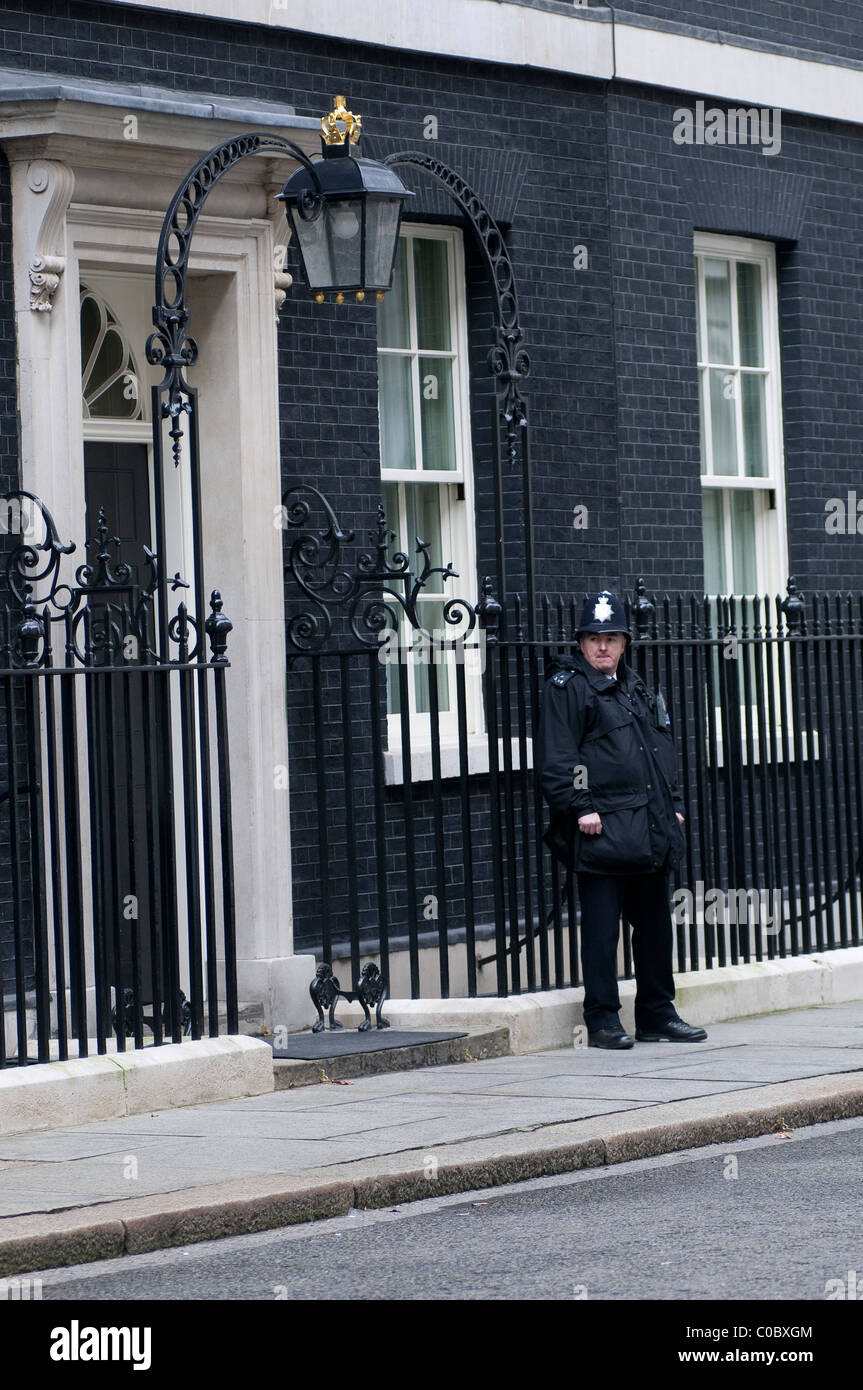 Policeman in Downing street, London, England, UK Stock Photo - Alamy