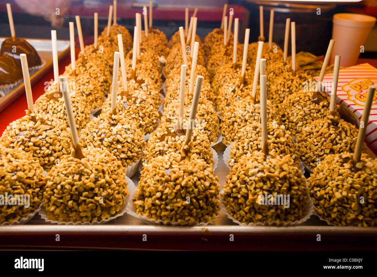 Caramel apples at carnival fair Stock Photo - Alamy
