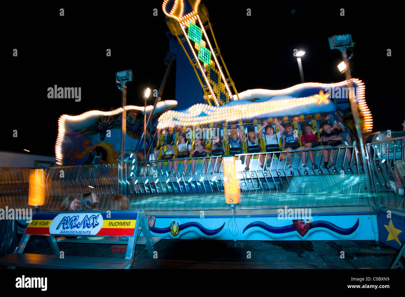 Carnival night ride hi-res stock photography and images - Alamy