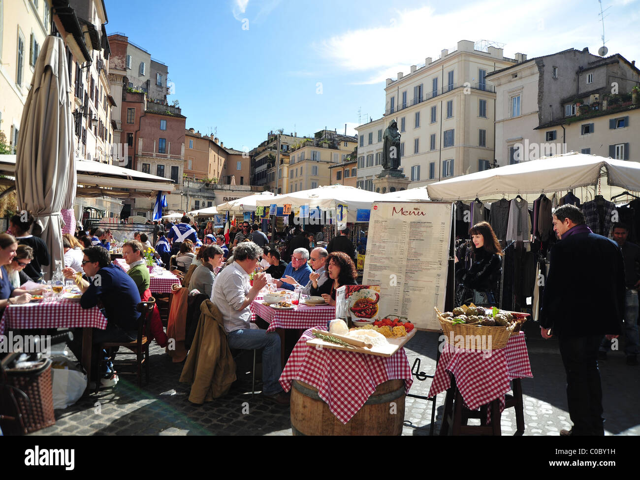 Rome, Italy - People eating at outside tables in Piazza Campo de Fiori ...