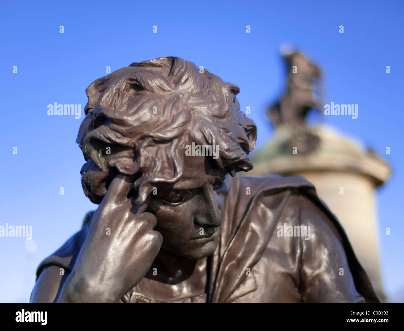 Statue of Hamlet with William Shakespeare behind Stratford upon Avon ...