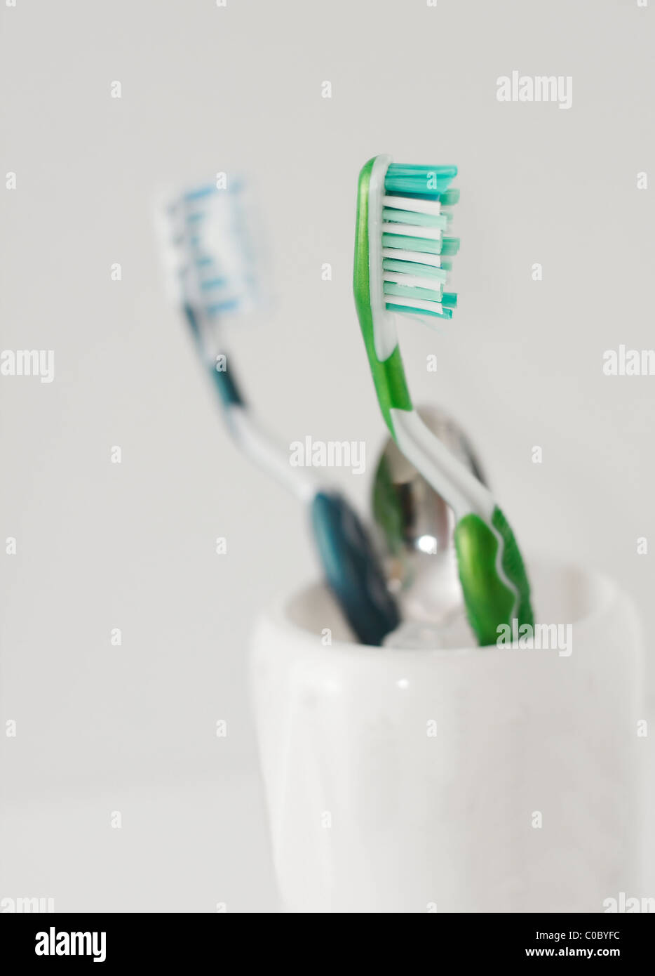 Toothbrushes in the bathroom Stock Photo - Alamy