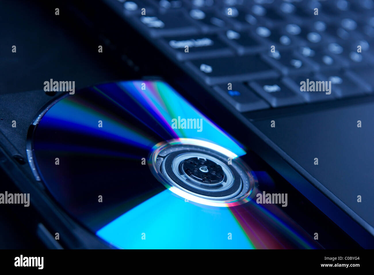Laptop with open cd tray Stock Photo - Alamy