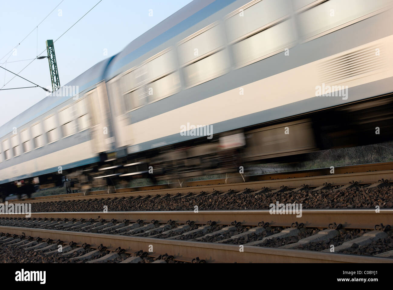 Train passing by with motion blur Stock Photo - Alamy