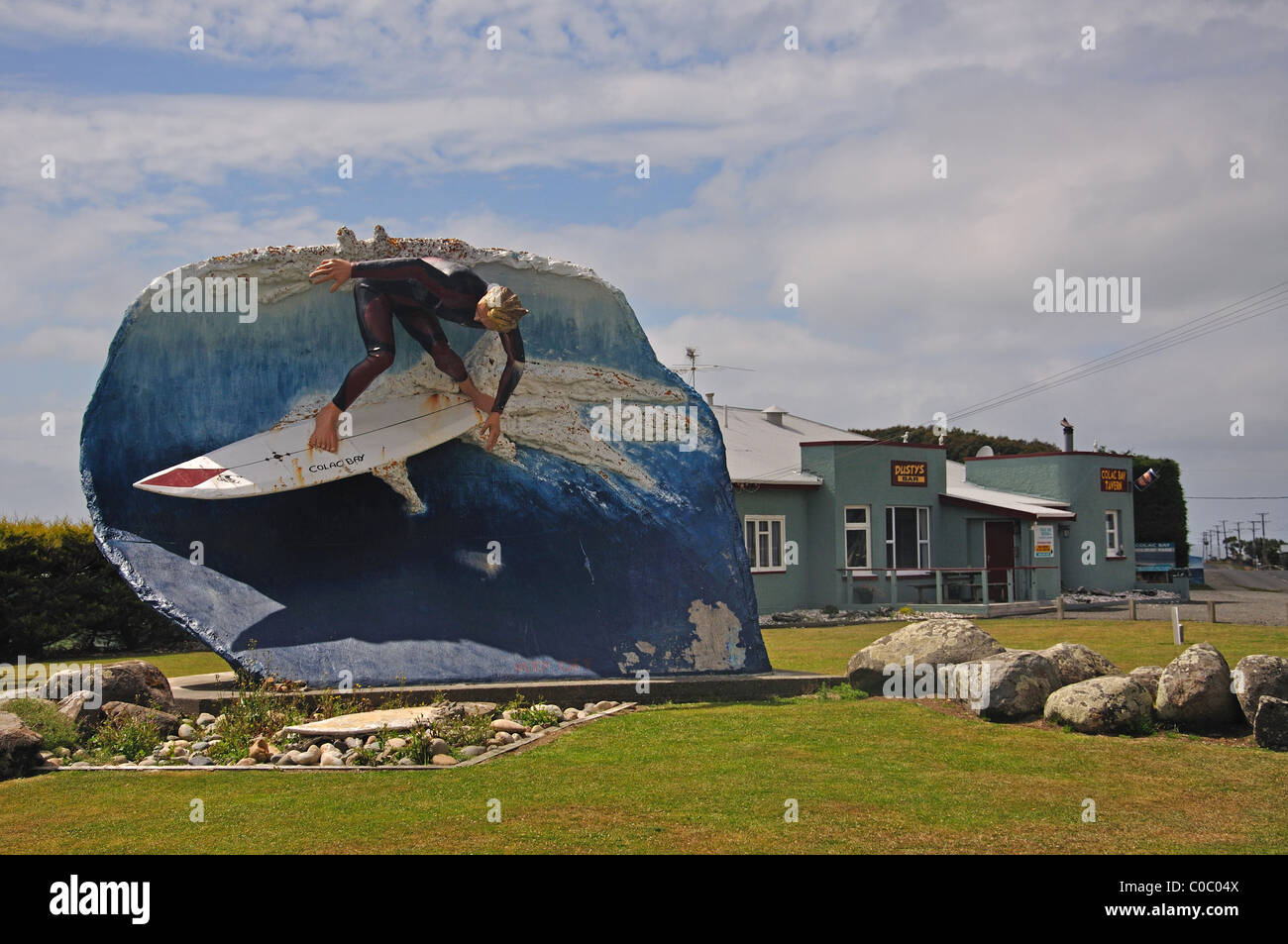 Statue of a surfer riding a wave, Colac Bay, Southland, South Island ...