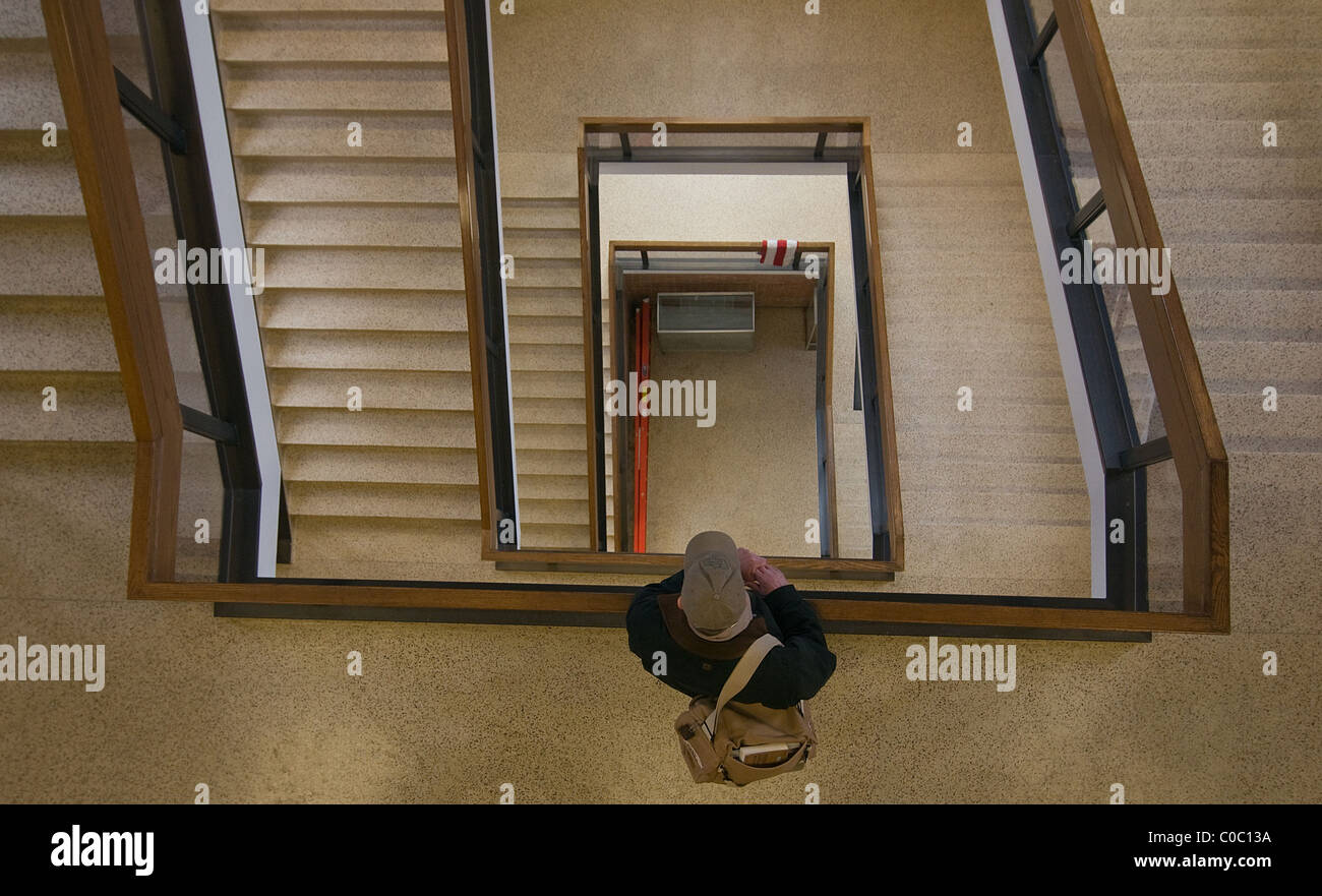 Person Looking down high staircase Stock Photo - Alamy