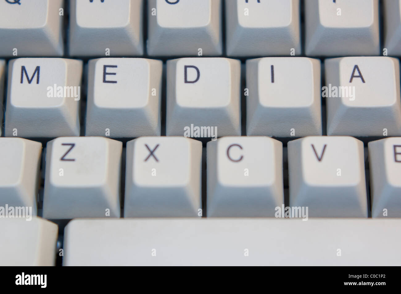 Computer keyboard with keys arranged to spell MEDIA Stock Photo - Alamy