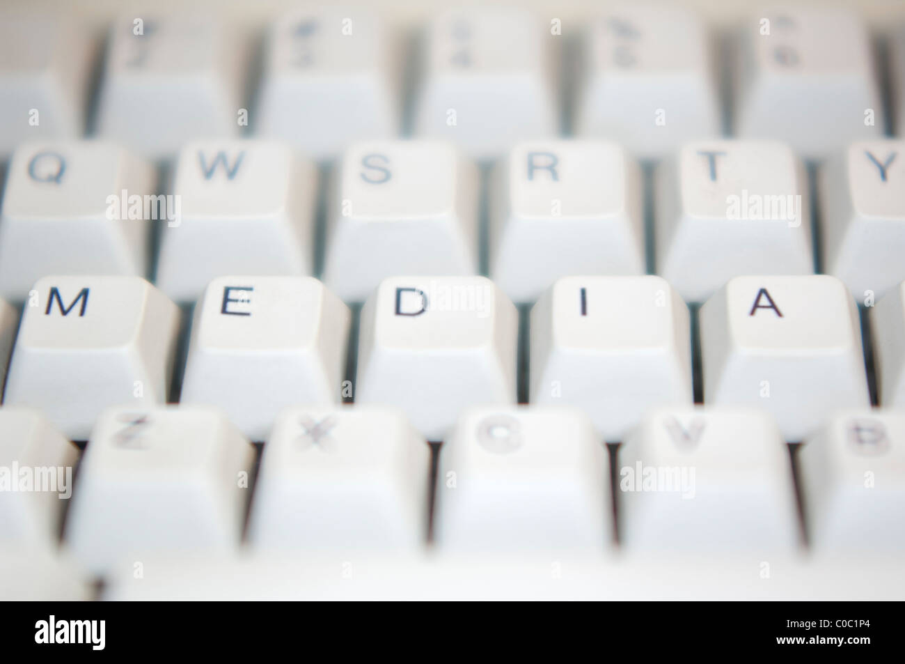 Computer keyboard with keys arranged to spell MEDIA Stock Photo - Alamy