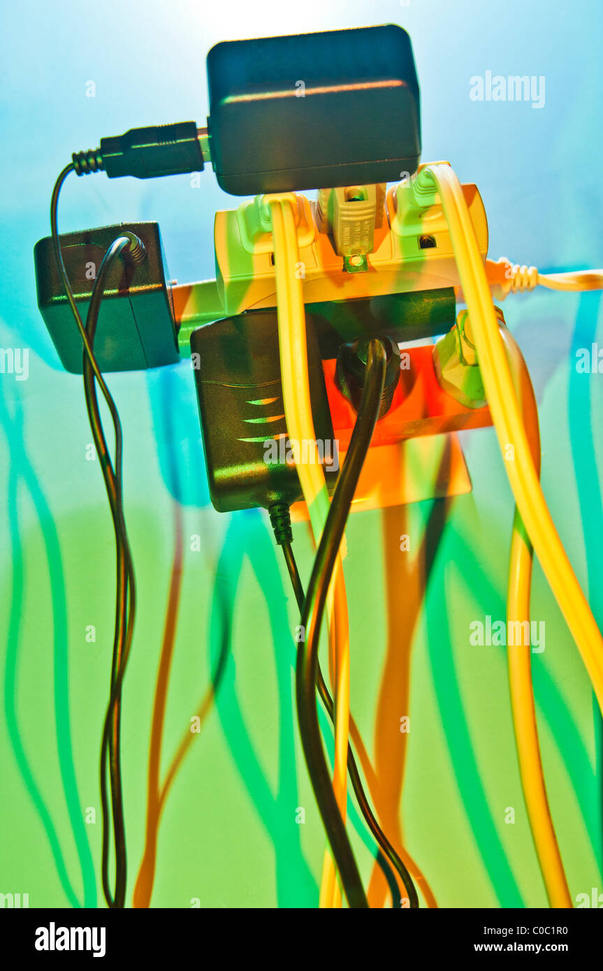Overloaded electrical outlet Stock Photo - Alamy