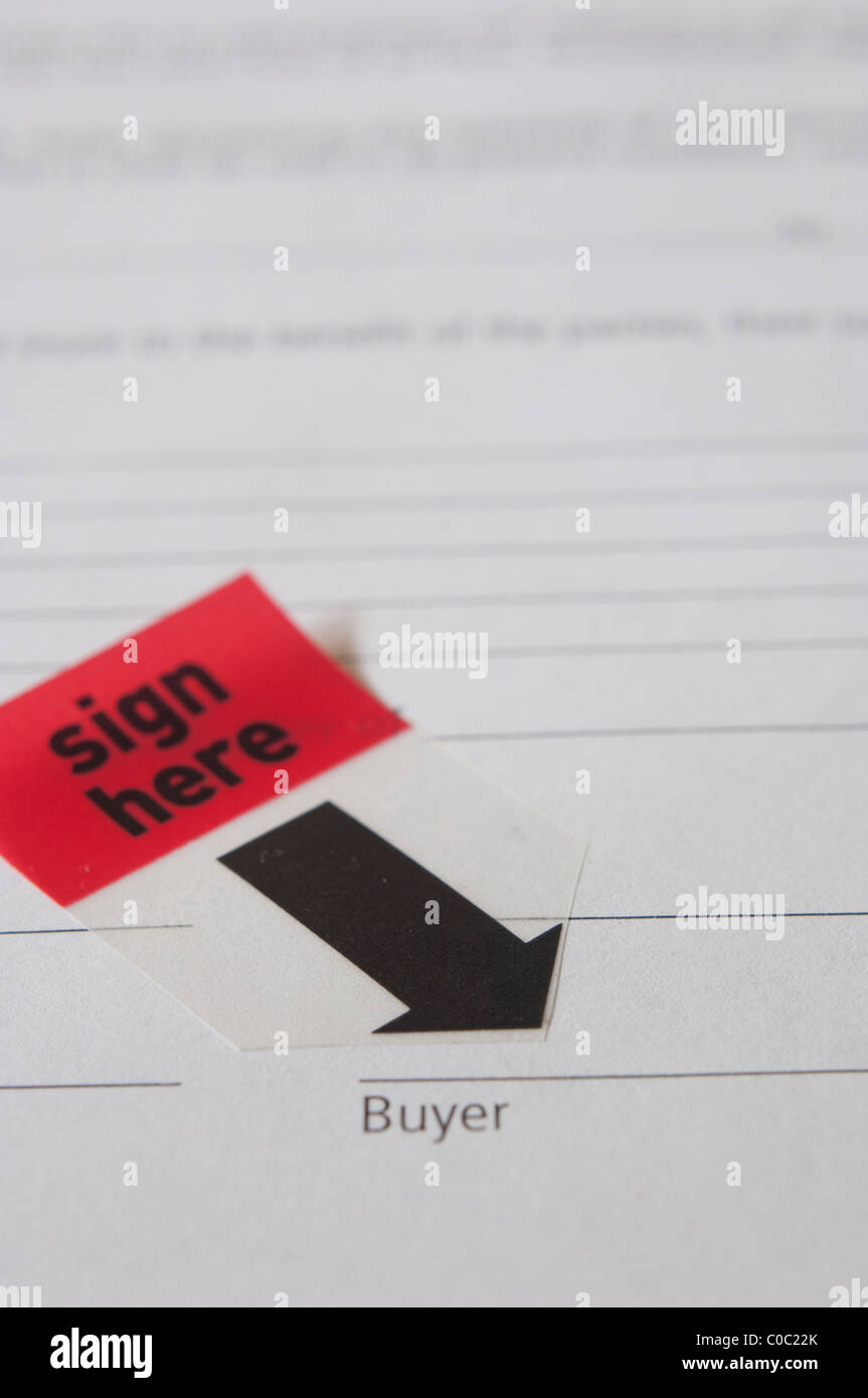 "Sign here" stickers on a contract Stock Photo - Alamy