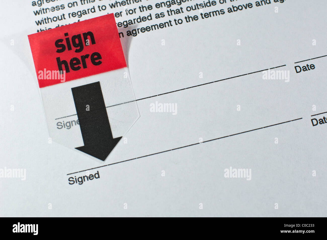 "Sign here" stickers on a contract Stock Photo - Alamy