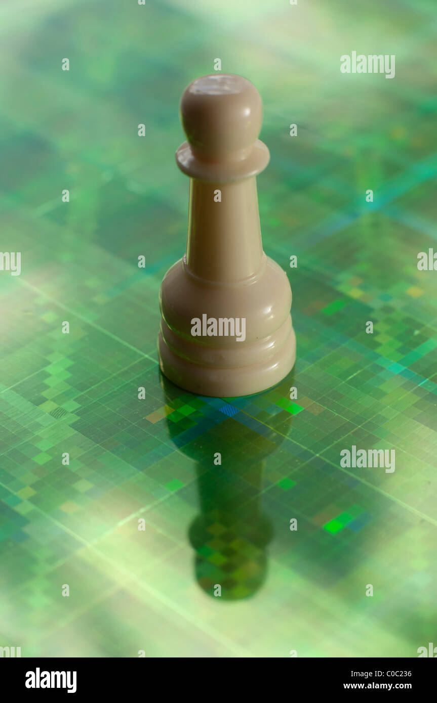Lone chess pawn in green coloring Stock Photo - Alamy